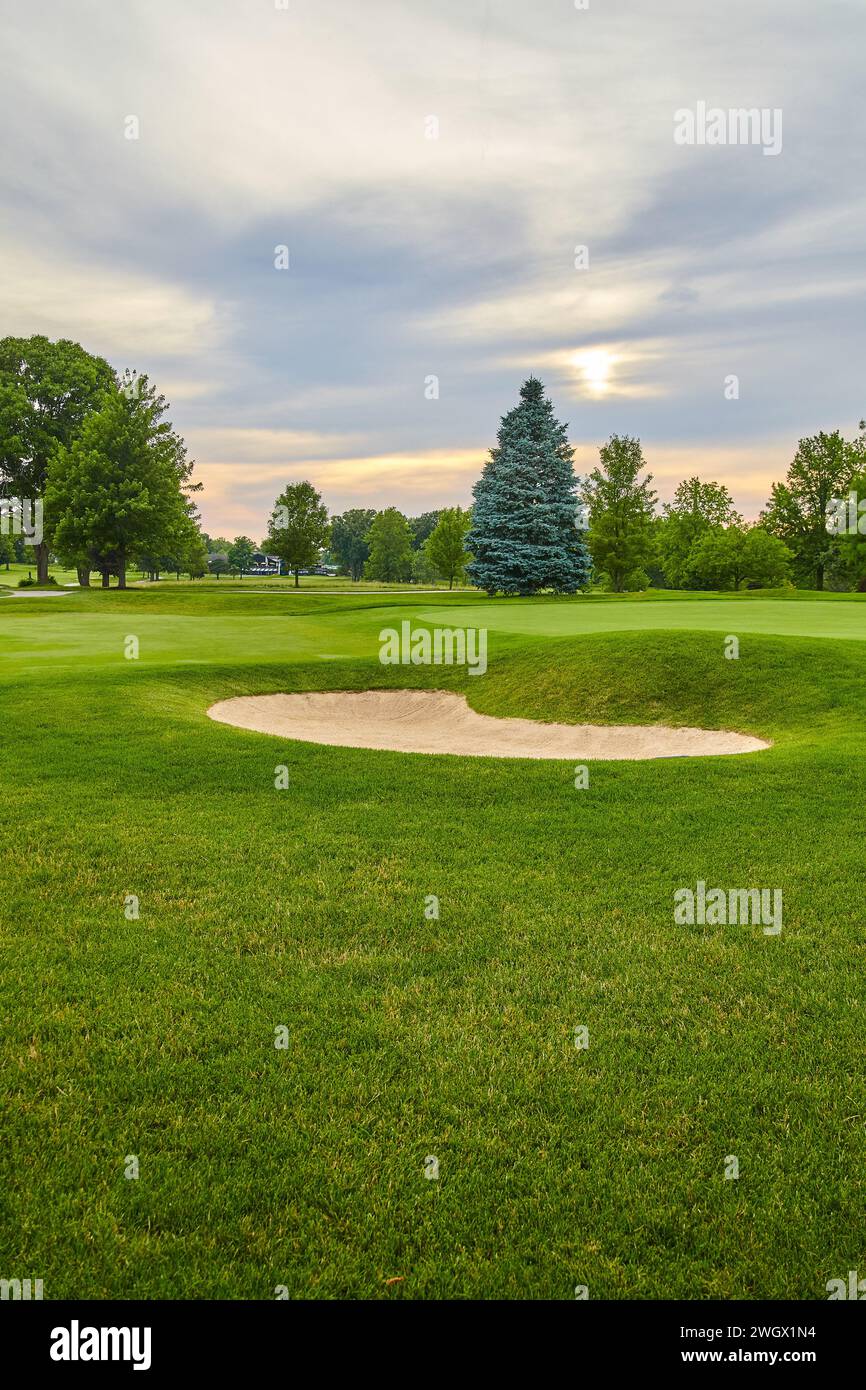 Golden Hour Serenity at Lush Golf Course with Sand Bunker and Blue ...