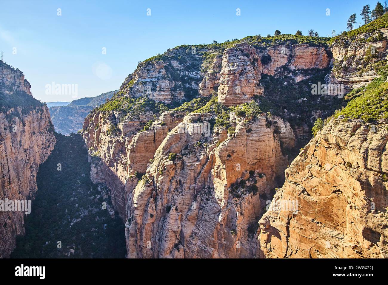 Aerial View of Sunlit Sedona Canyon Cliffs with Sparse Vegetation Stock ...