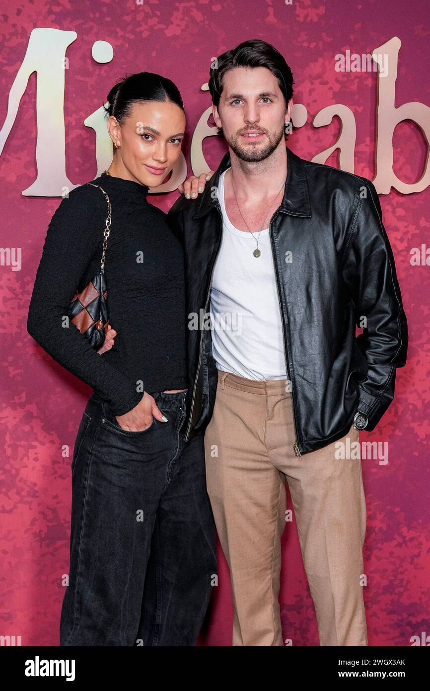 Melanie Anne Haynes, left and Jack Parr pose for photographers upon ...