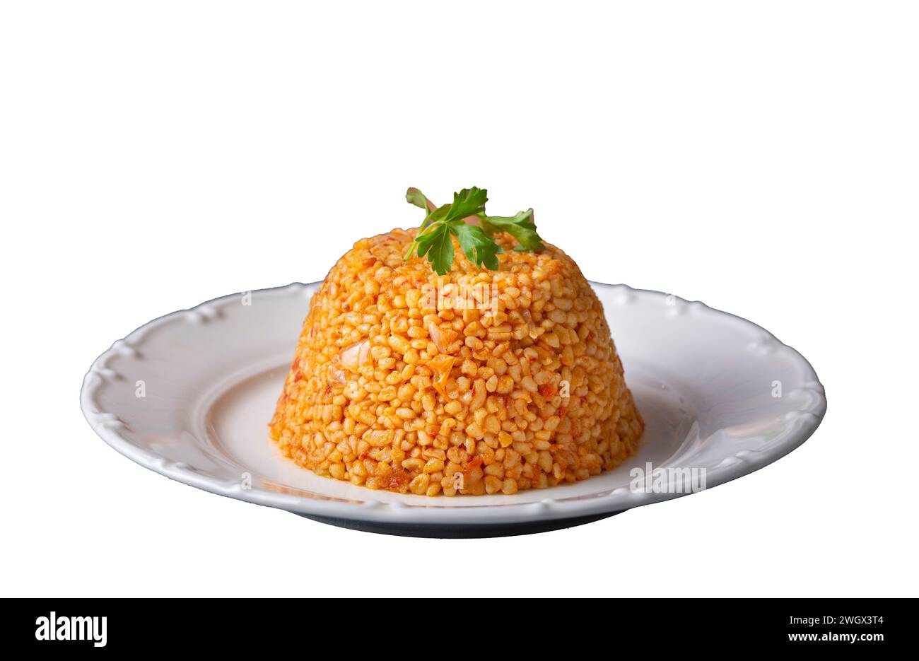 Traditional Turkish cuisine; Bulgur pilaf with tomatoes. Turkish name ...