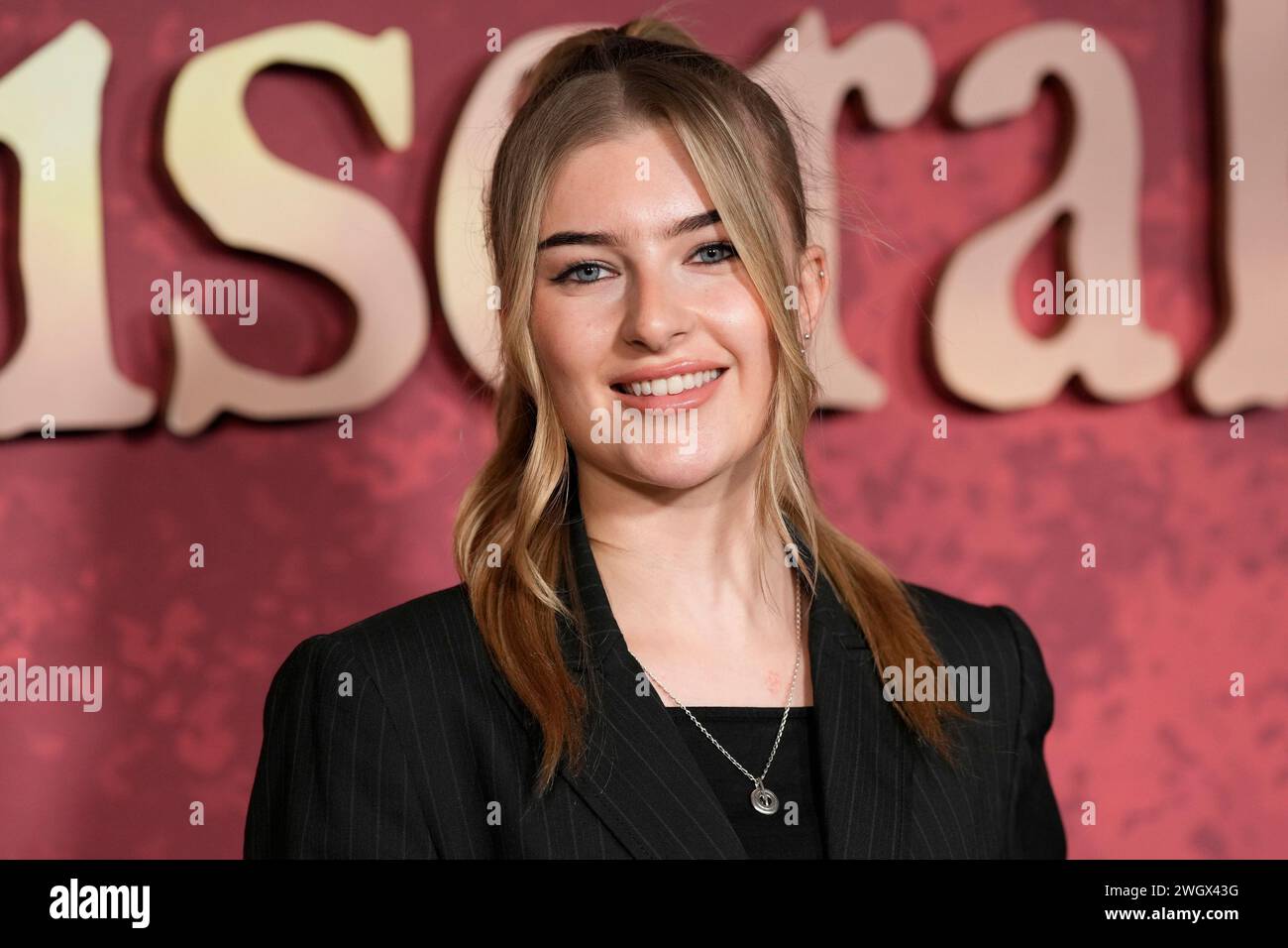 Becky Cooke poses for photographers upon arrival for a special VIP ...