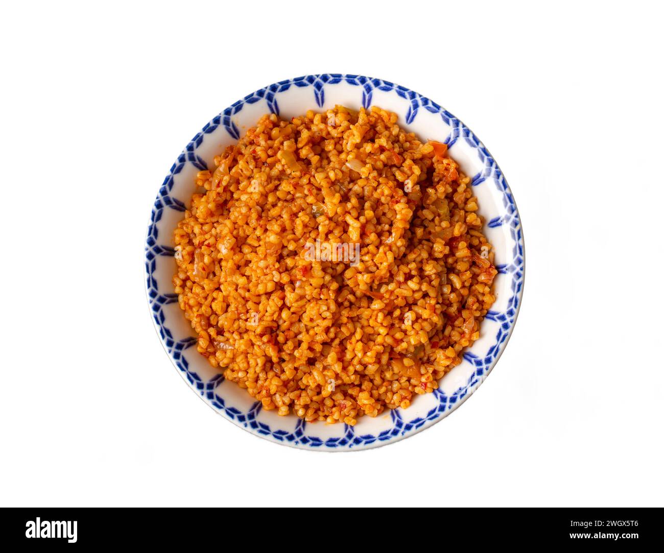 Traditional turkish bulgur pilaf with tomato sause in plate (Turkish ...