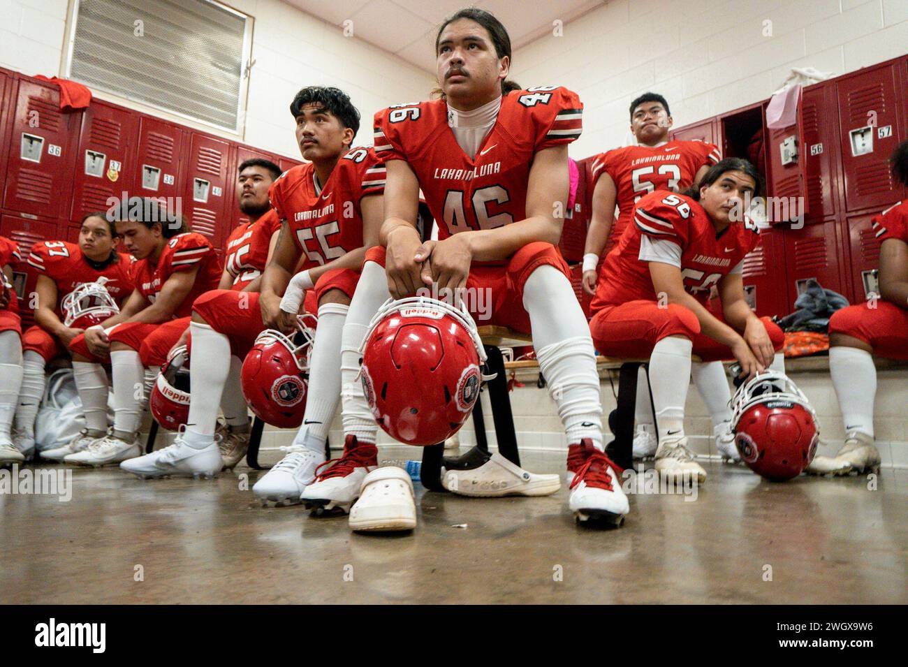 FILE - Lahainaluna High School football team players listens to co-head ...