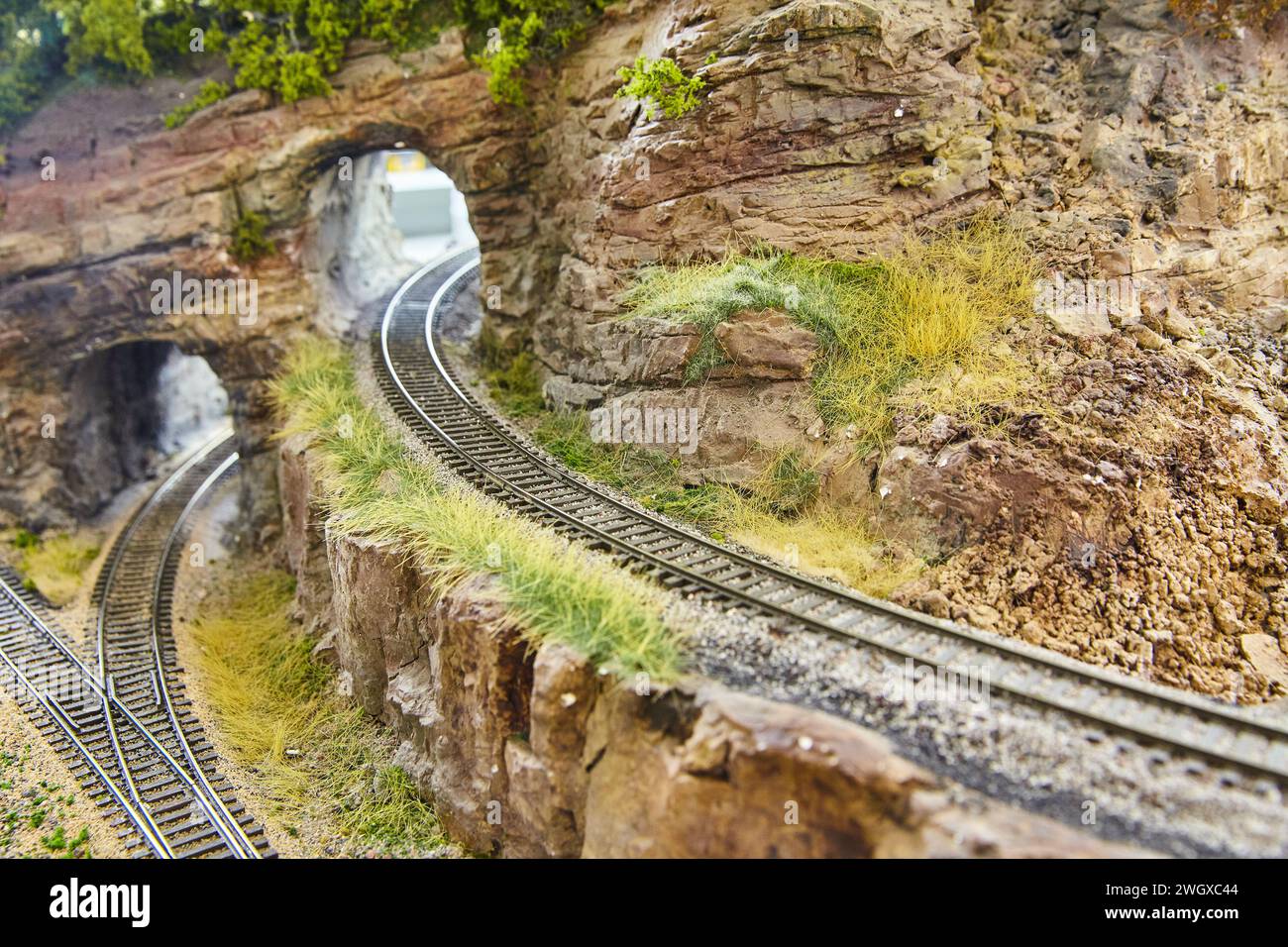 Miniature Railway Track in Rugged Landscape with Eye-level Perspective ...