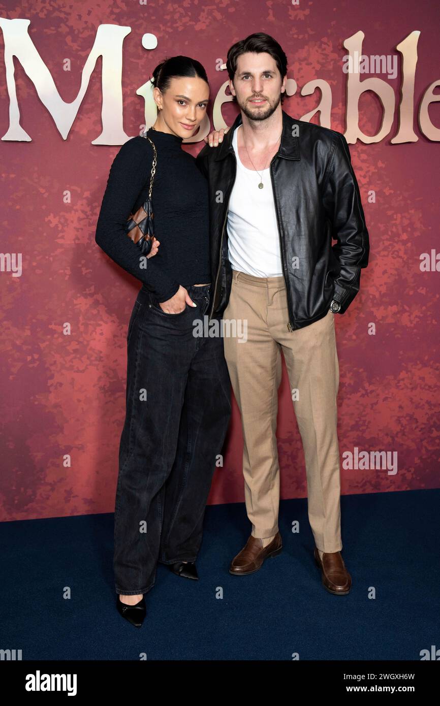 Melanie Anne Haynes, left and Jack Parr pose for photographers upon ...