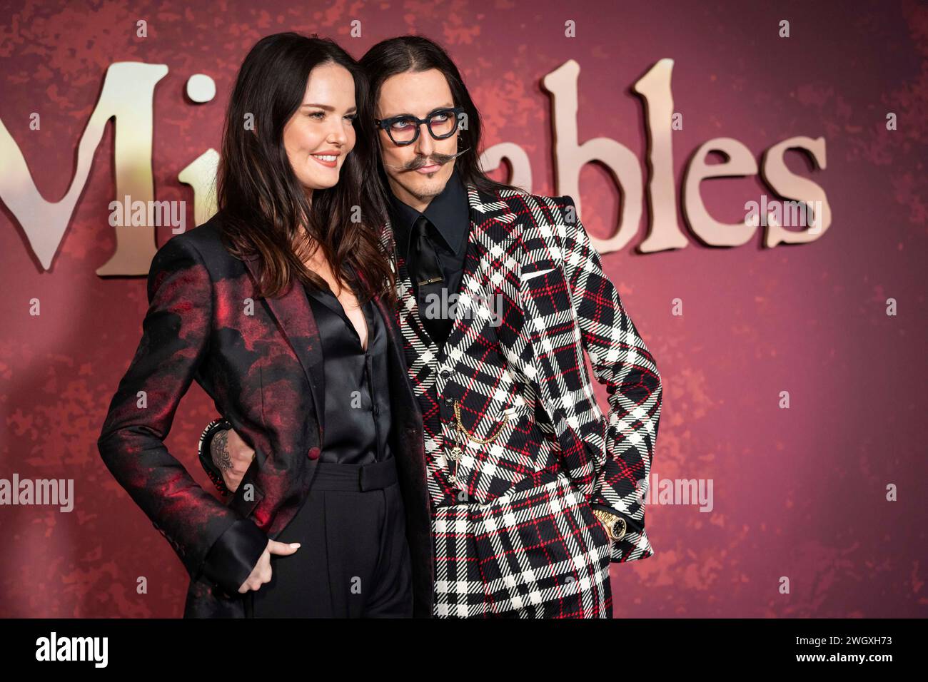 Lottie Archer-Kane and Joshua Kane, right pose for photographers upon arrival for a special VIP ...