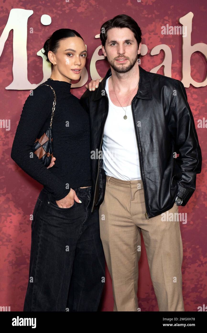 Melanie Anne Haynes, left and Jack Parr pose for photographers upon ...