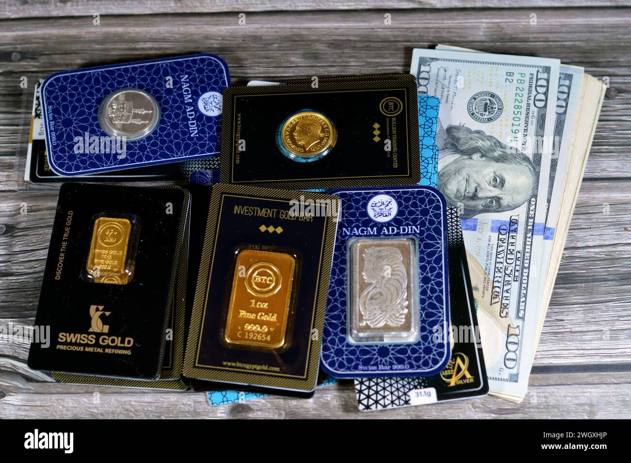 Cairo, Egypt, January 29 2024: American dollars bills, BTC, Sam, Swiss ...