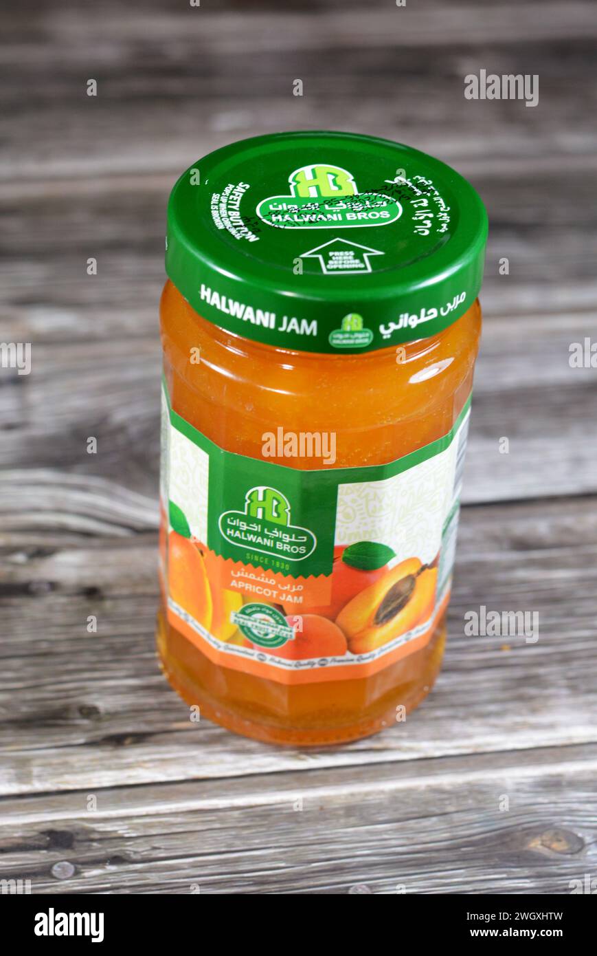 Cairo, Egypt, February 4 2024: Halwani Bros apricot jam Haalwani bottle ...