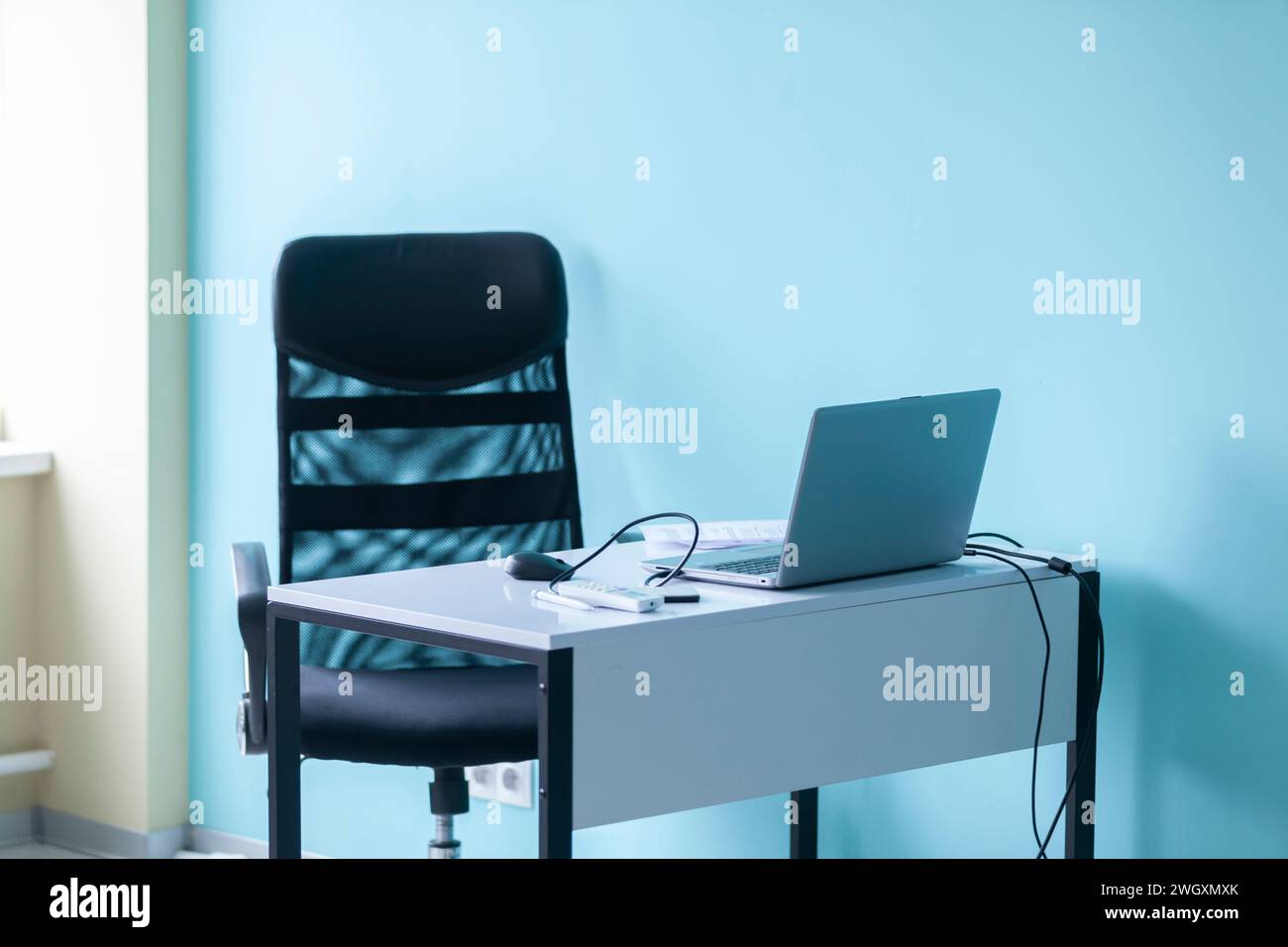 Empty workplace in the office: laptop, table and armchair Stock Photo ...