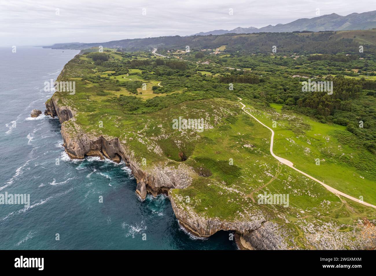 Shore with geological caves made by waves by jesters bufones of ...