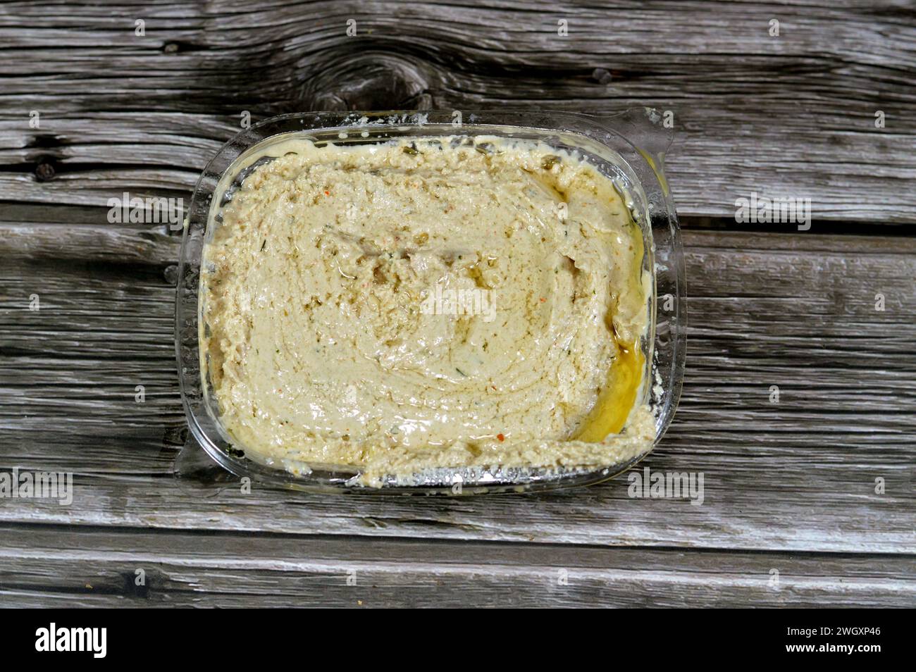 Tahini Tahina which is a Middle Eastern condiment made from toasted ...