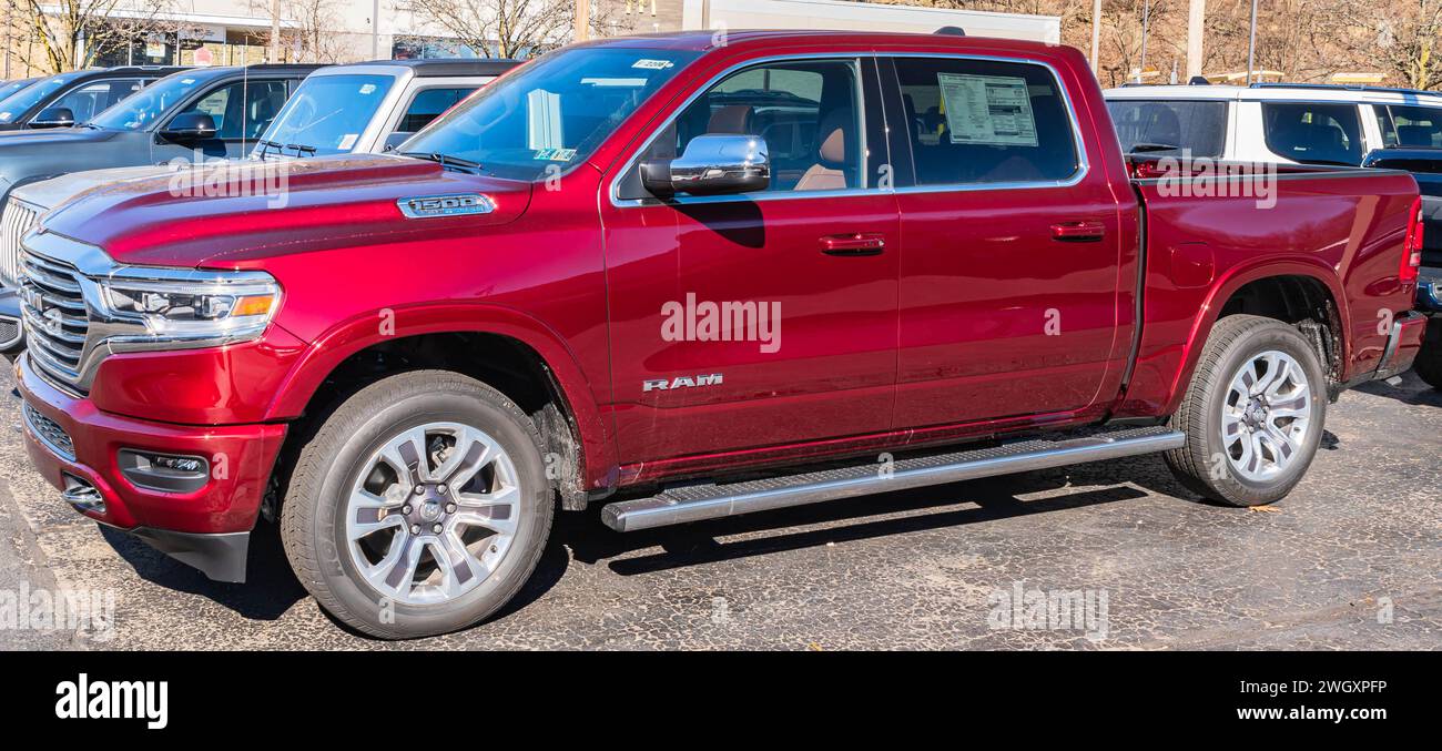 A Dodge Ram 1500 four door pickup truck for sale at a dealership Stock ...