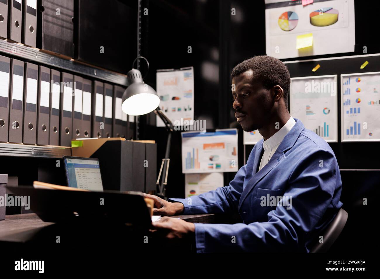 Police officer analyzing criminology report, checking crime scene ...