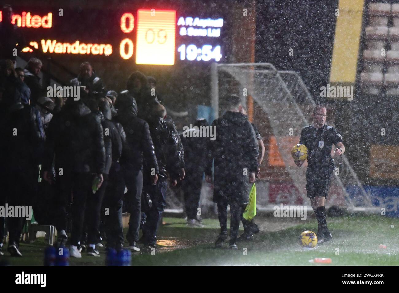 Referee David Rock (Match referee) stops play after 9 minutes during ...