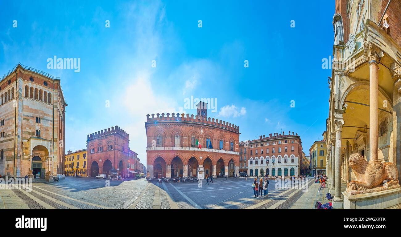 Panorama of Piazza del Comune with medieval stone lion statues on porch ...