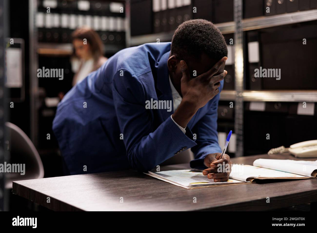 African american inspector thinking at ideas to solve criminal case ...