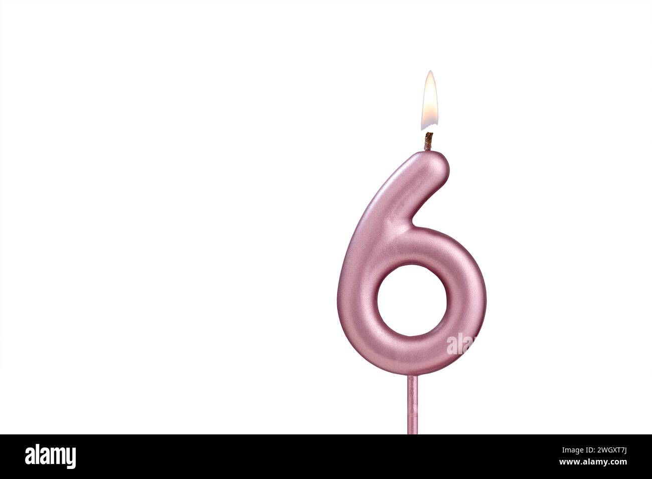 Lit birthday candle - Candle number 6 on white background Stock Photo ...