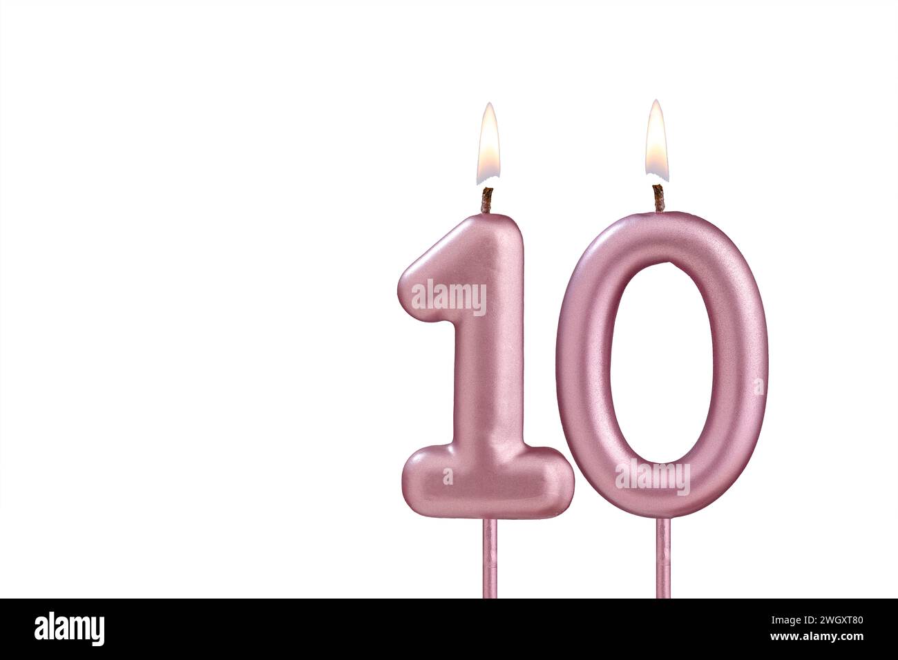 Lit birthday candle - Candle number 10 on white background Stock Photo ...