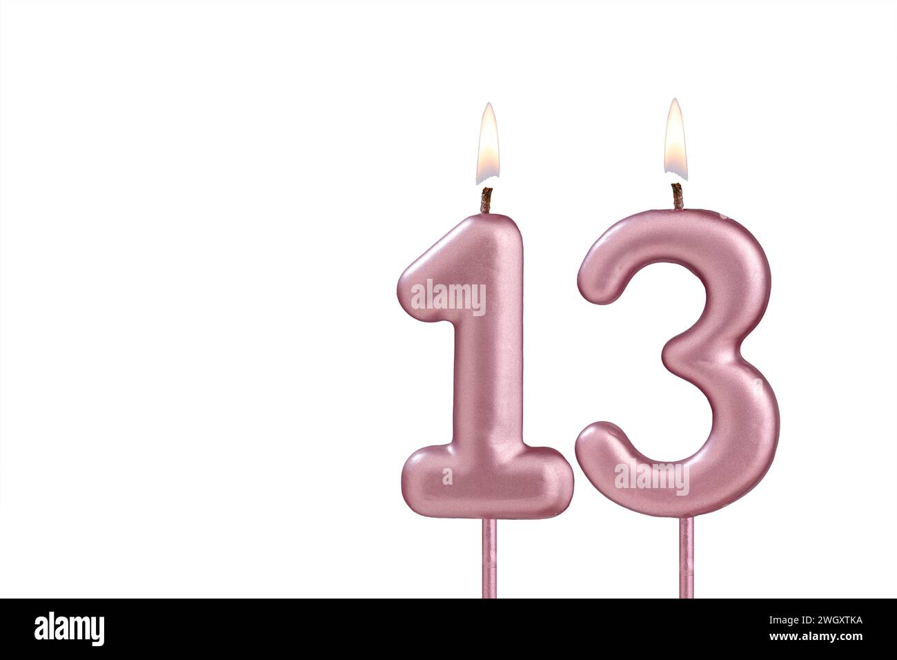 Candle number 13 - Lit birthday candle on white background Stock Photo ...