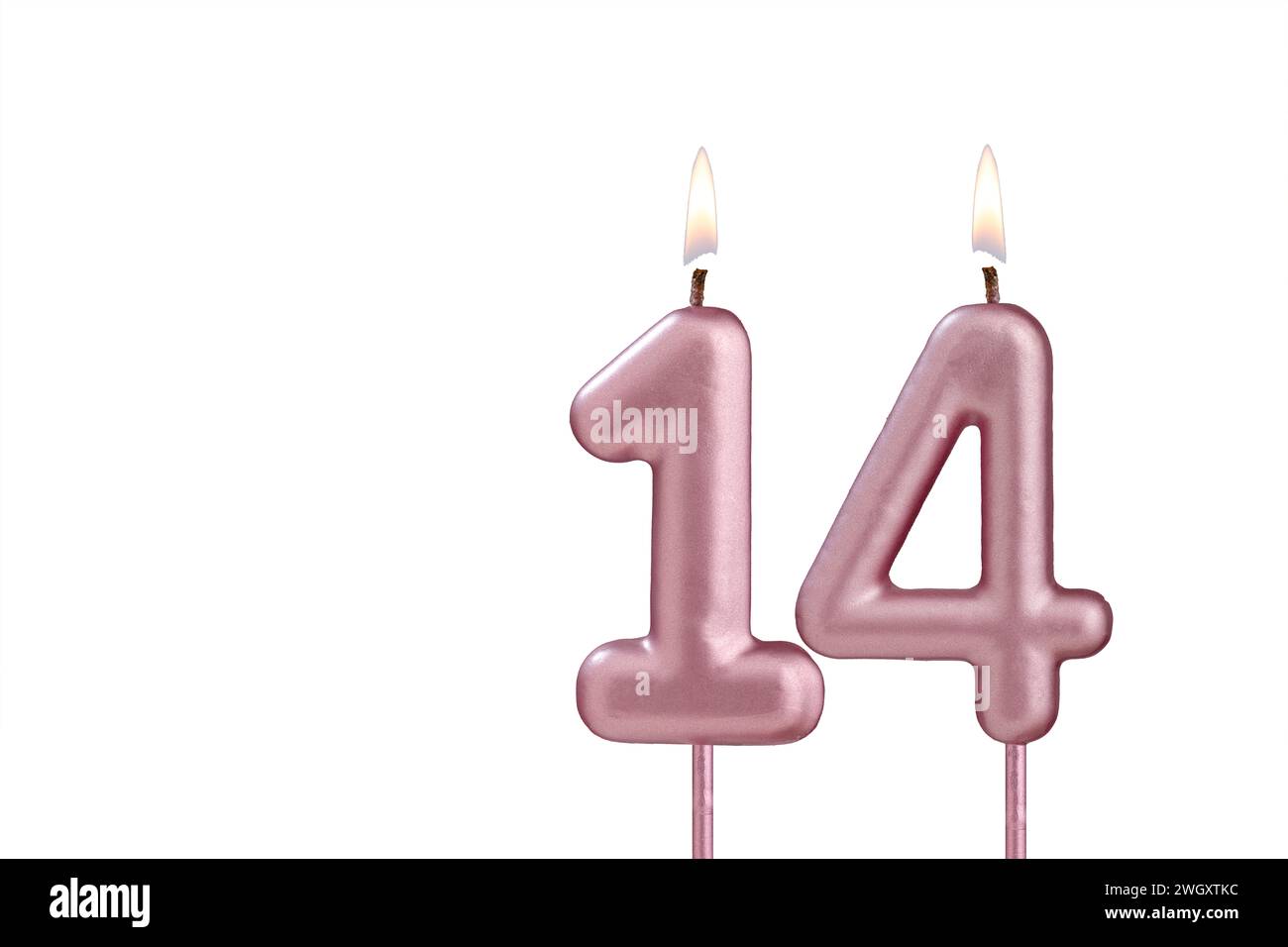 Lit birthday candle - Candle number 14 on white background Stock Photo ...