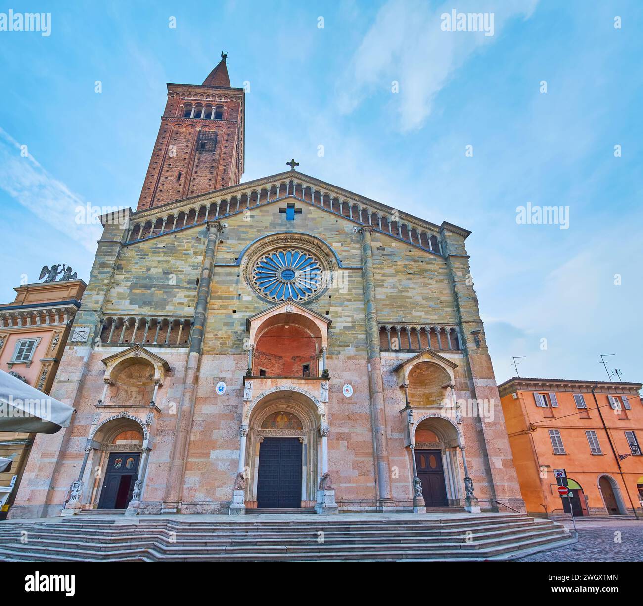 The carved stone facade of Piacenza Cathedral, decorated with ...