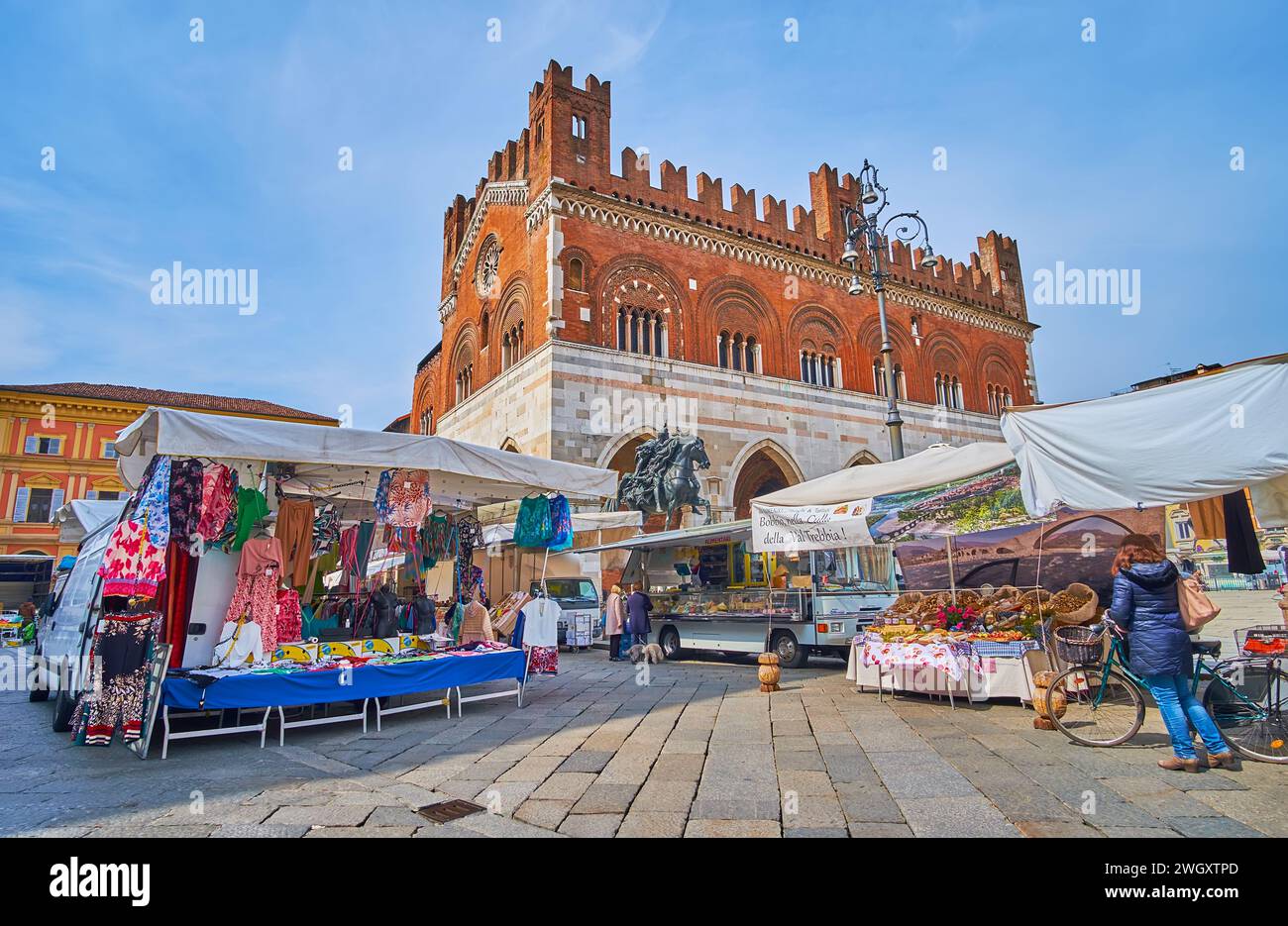 The medieval Piazza Cavalli with Gothic Palazzo Comunale (Town Hall ...