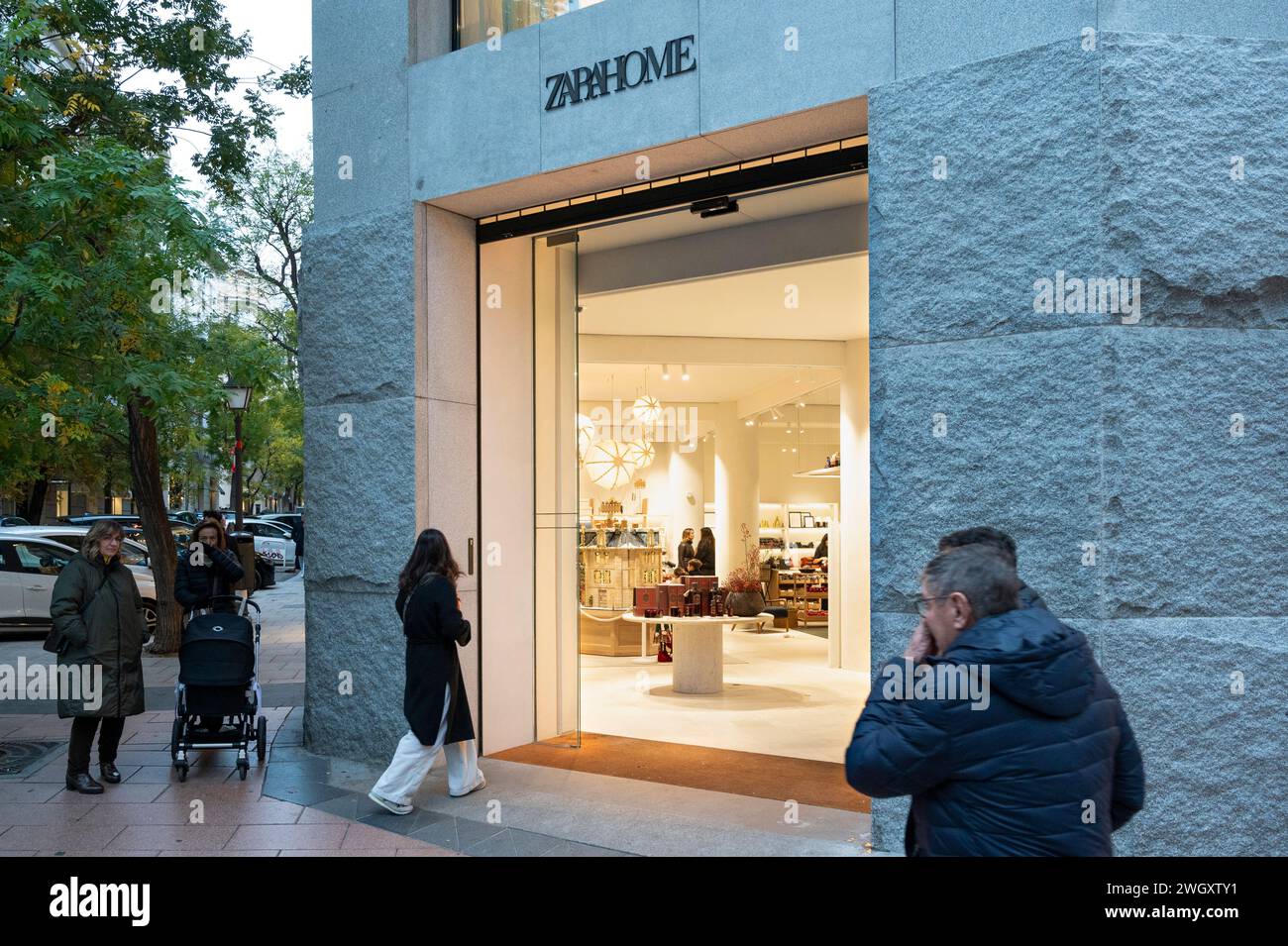 Madrid, Spain. 06th Feb, 2024. Pedestrians walk past the Spanish ...