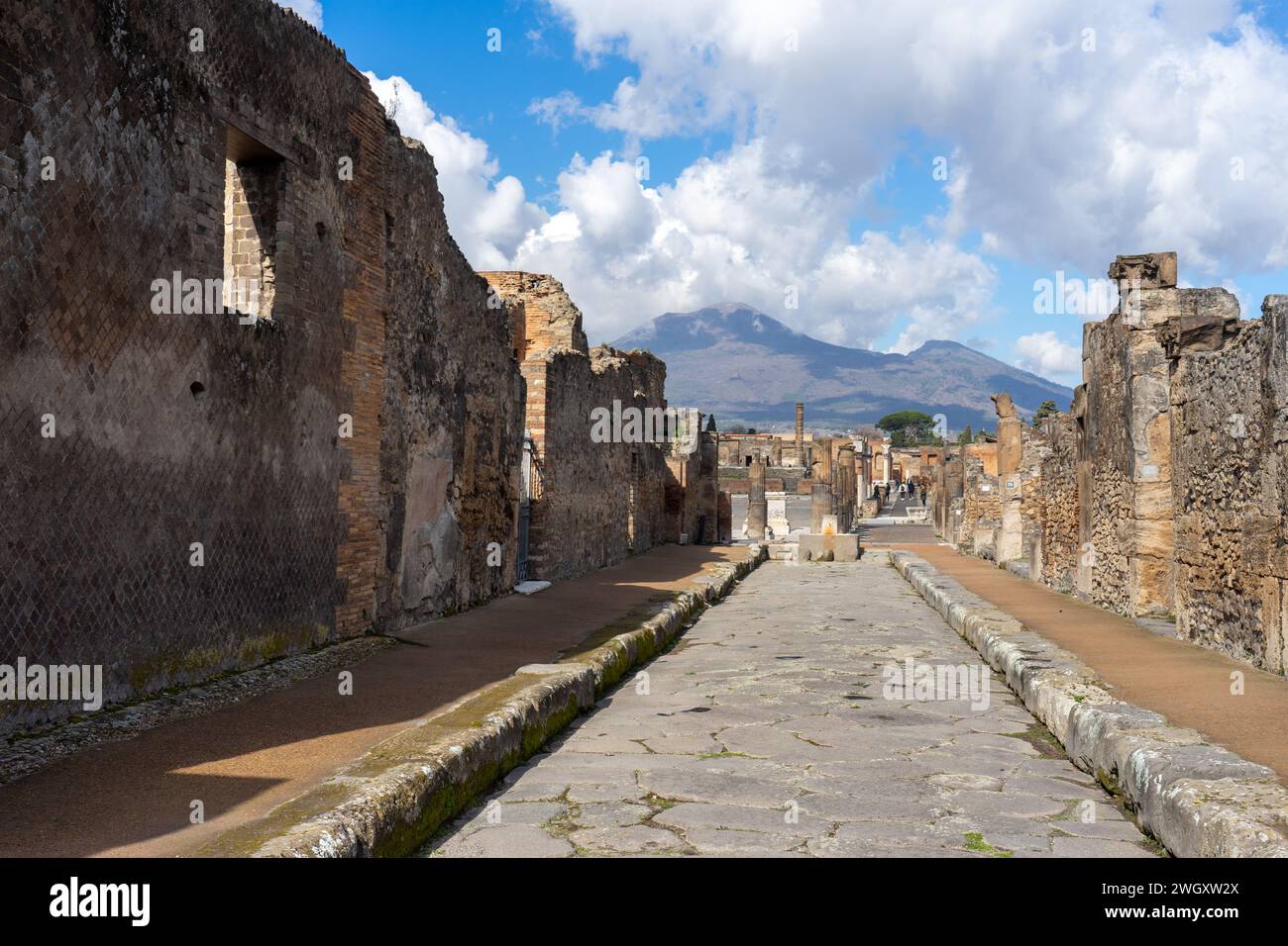 road with vesuvius volcano background in pompeii archeological. Pompeii ...