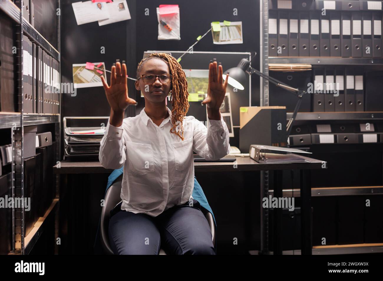 African american woman police detective using ar to visualize crime ...