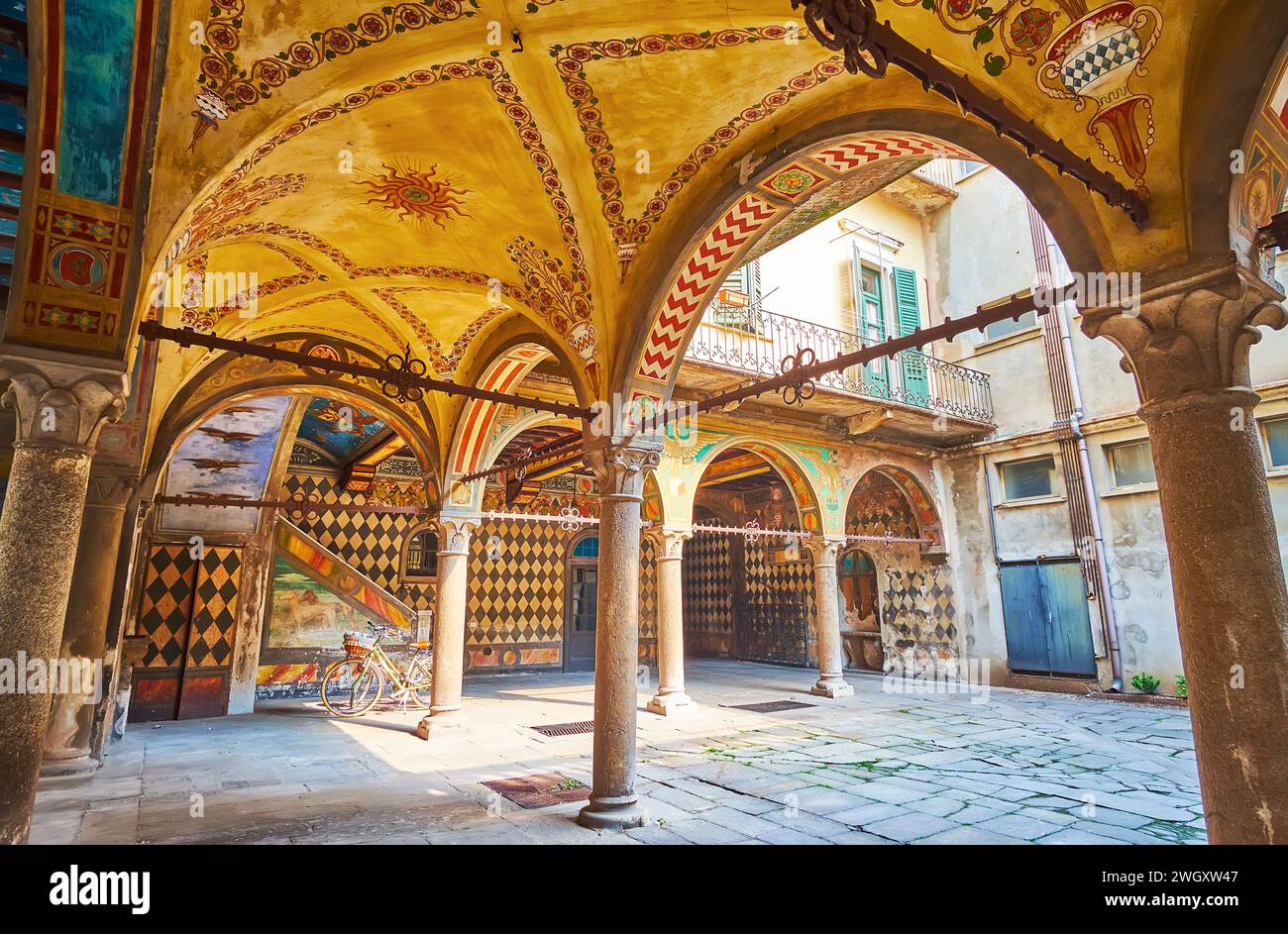 CREMONA, ITALY - APRIL 6, 2022: The frescoed arcade with stone columns ...