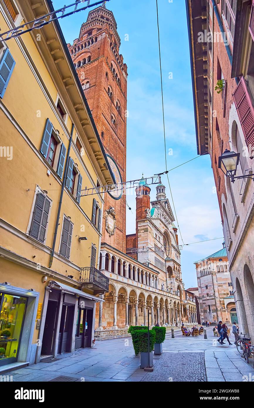 The medieval Cremona Cathedral with tall Torrazzo bell tower from Via ...
