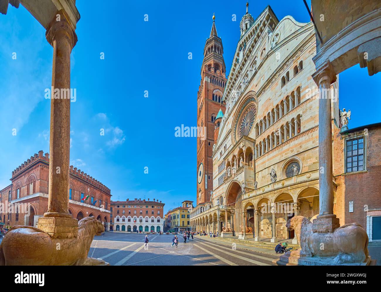The tall pillars and stone statues of lions on the porch of Baptistery ...