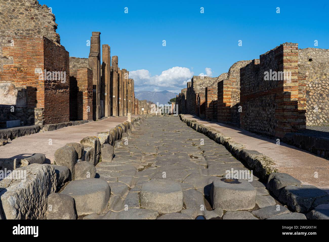 road with vesuvius volcano background in pompeii archeological. Pompeii ...