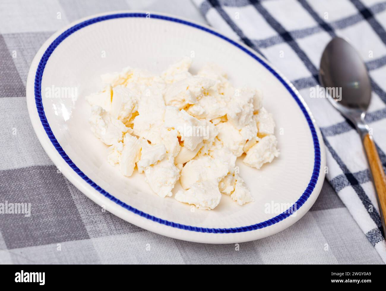Homemade fresh whey cheese from goat milk on plate Stock Photo - Alamy