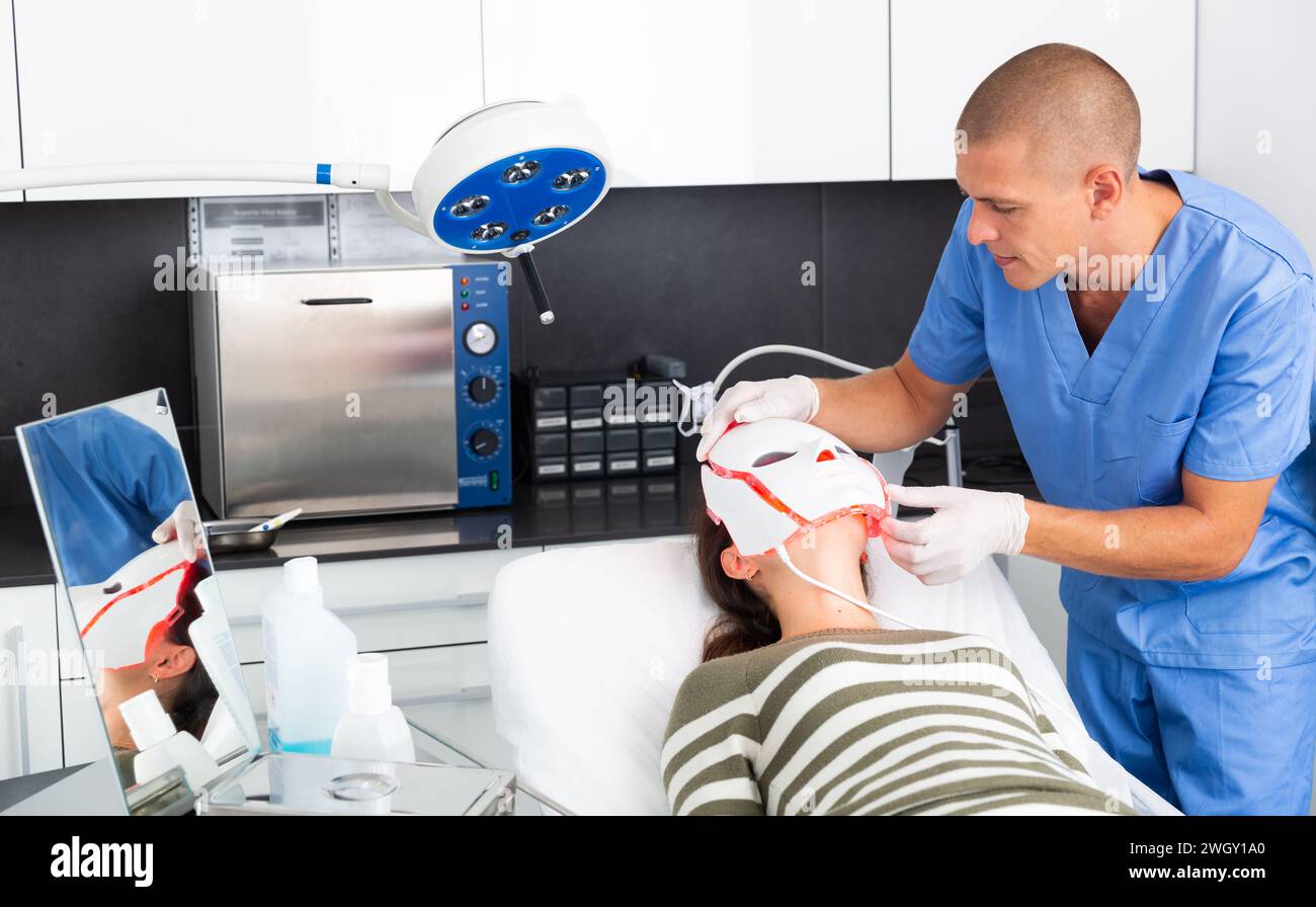 Female patient receiving facial mask hi-res stock photography and ...