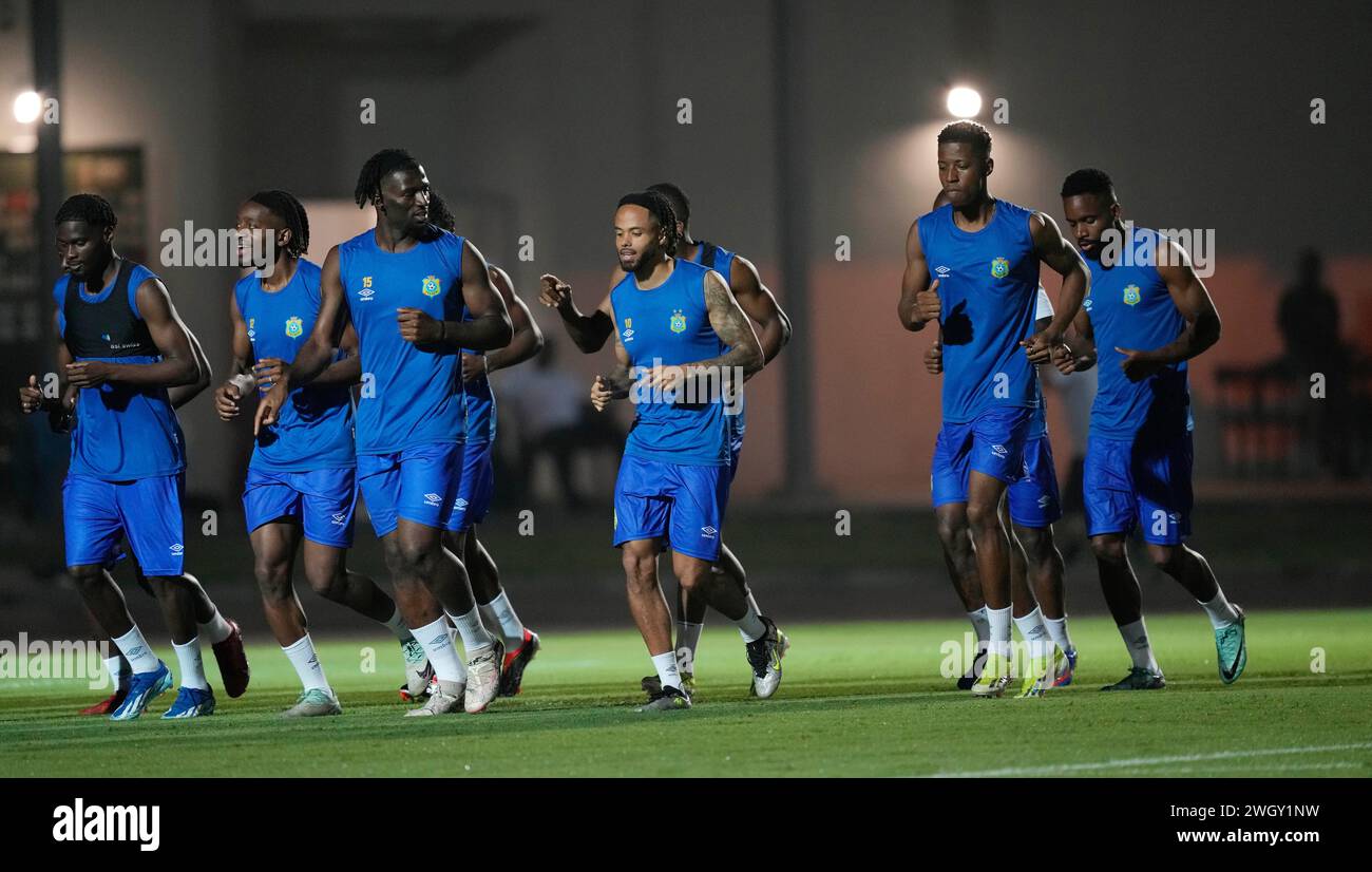 DR Congo's Soccer players jog to warm up for their training in Abidjan ...