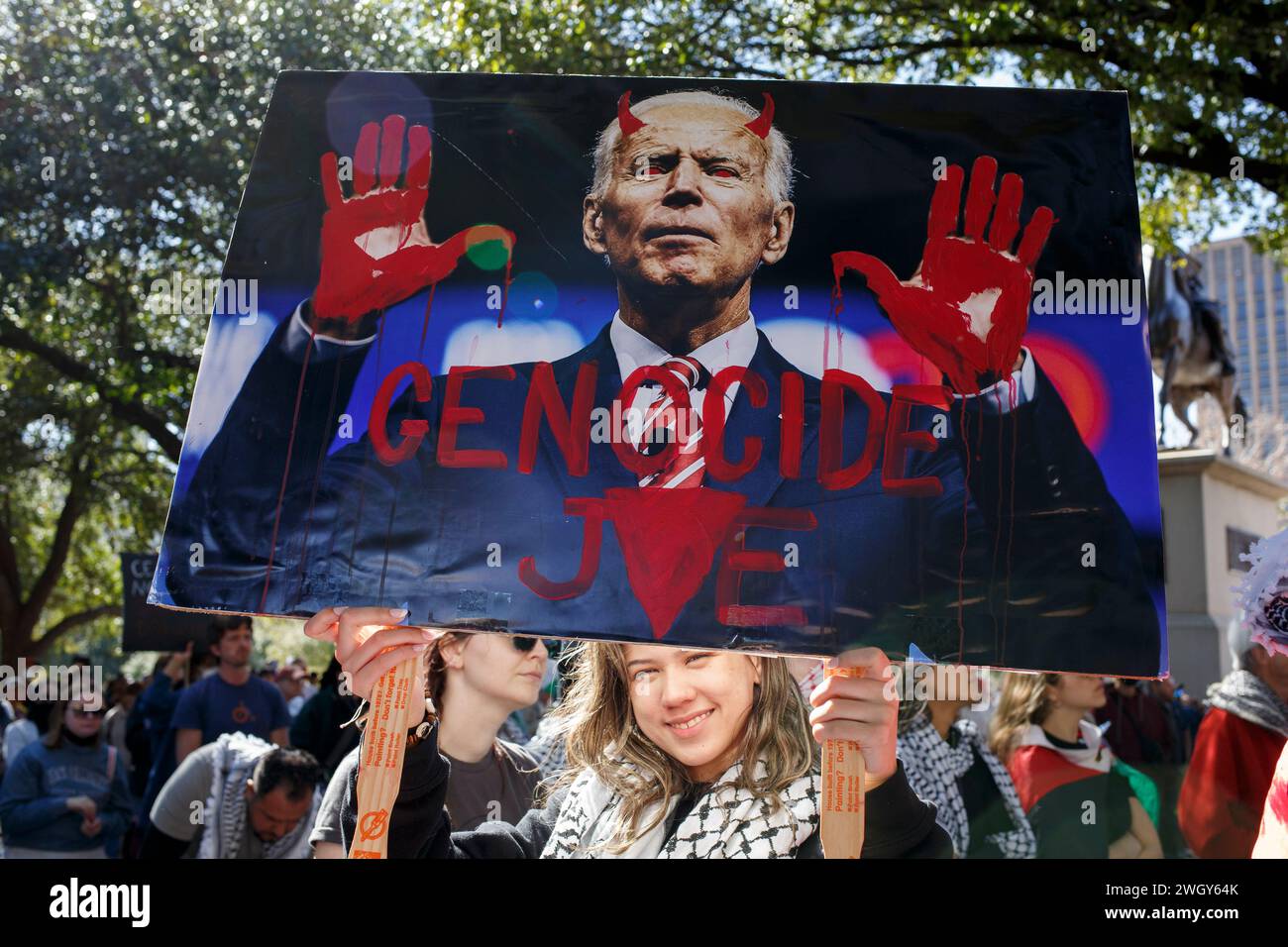 Austin, Texas, USA. 4th Feb, 2024. A woman holds a sign where she sates ...
