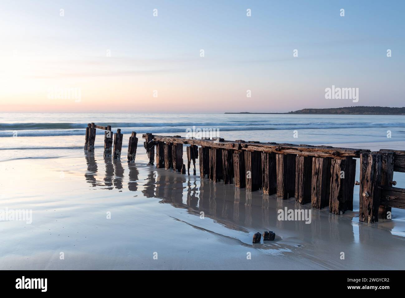 The Victor Harbor erosion groyne with granite island in background and ...