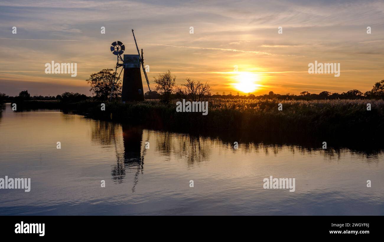 How Hill, UK - October 17, 2023: Sunset on Turf Fen Drainage Mill at ...