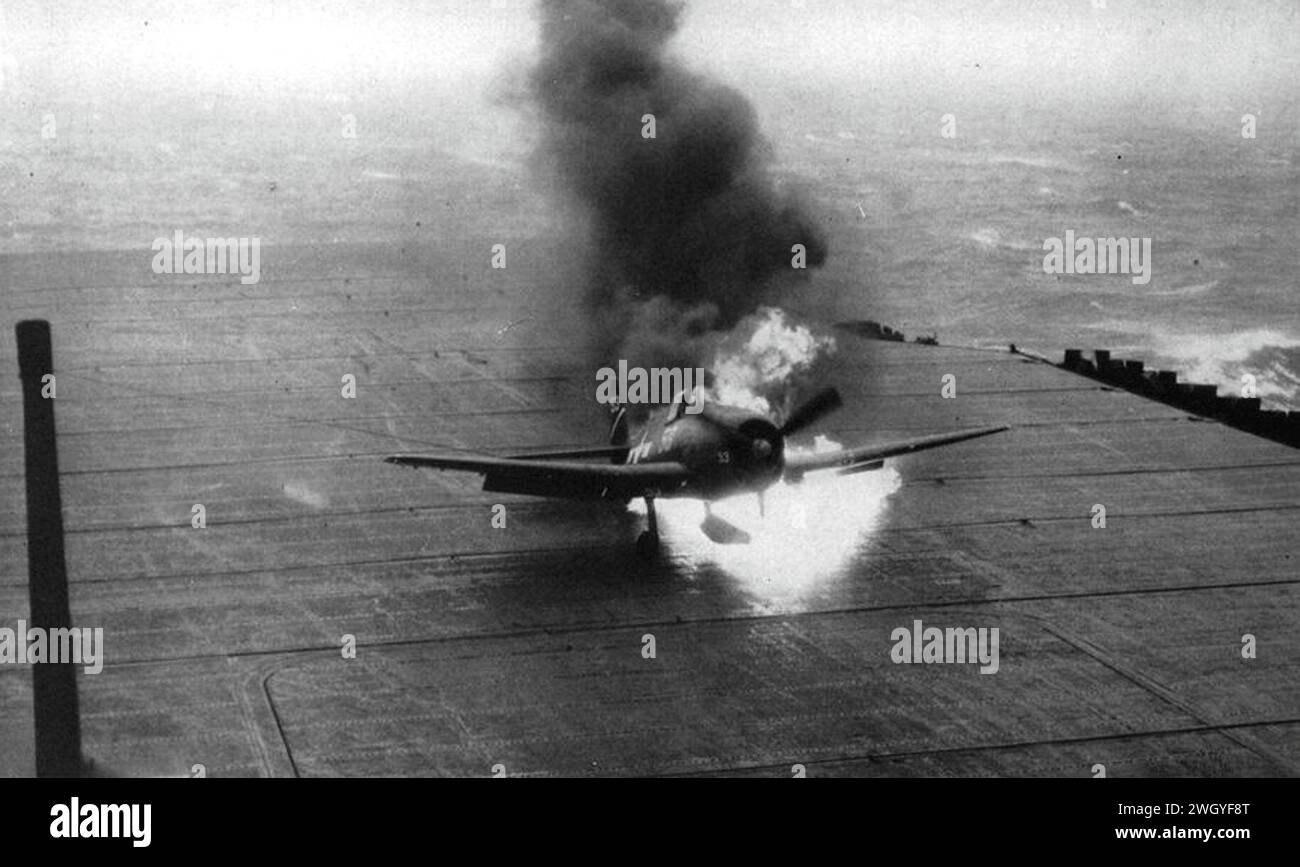 Auxiliary fuel tank of F6F-5 Hellcat of VF-81 bursts into flames aboard ...
