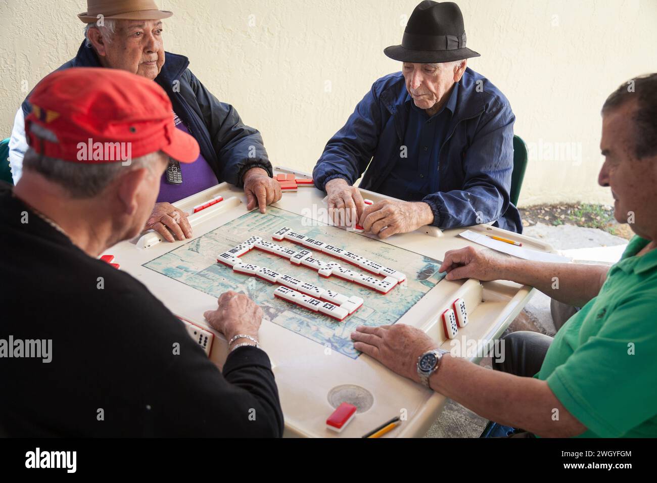 Senior men playing dominoes at the Maximo Gomez Park Domino Club, Miami ...