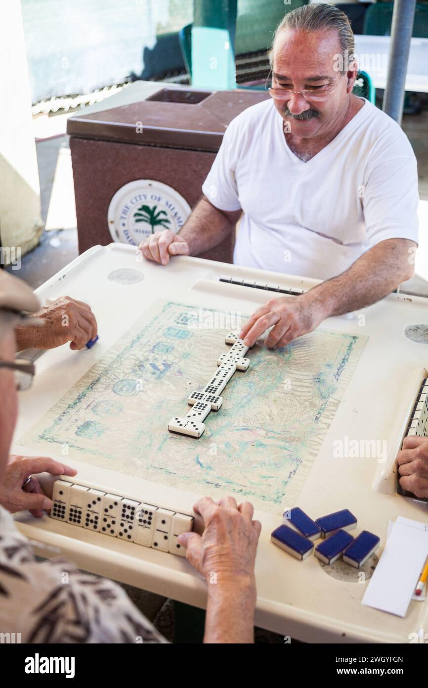 Senior men playing dominoes at the Maximo Gomez Park Domino Club, Miami ...