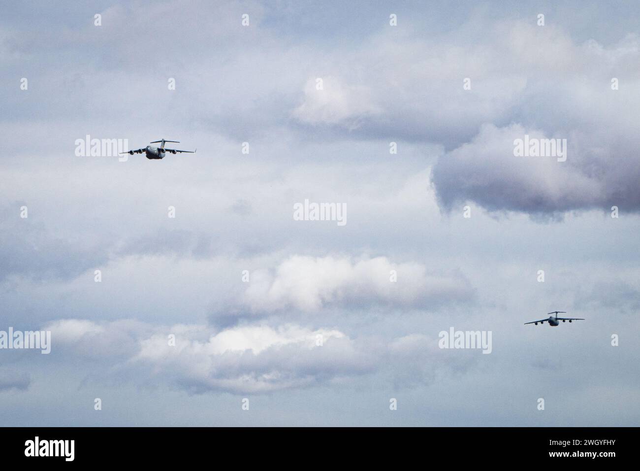 A U.S. Air Force C-17 Globemaster III, left, with the 97th Air Mobility ...