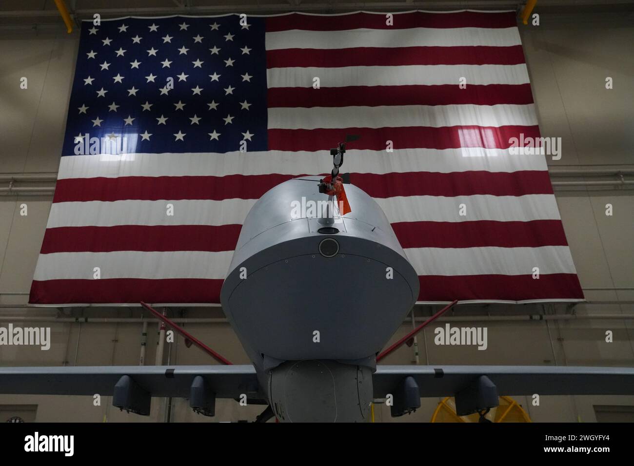 An MQ-9 Reaper remotely piloted aircraft is parked in a hangar at ...