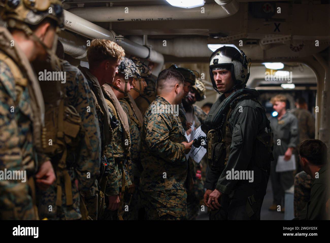 A U.S. Marine Corps helicopter crew chief assigned to Marine Medium ...