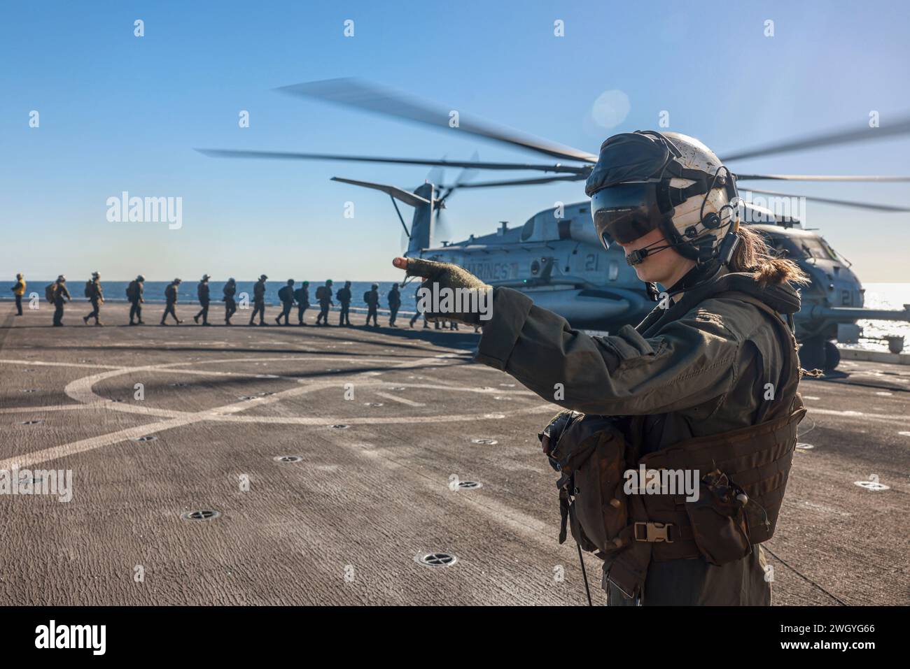 A U.S. Marine Corps helicopter crew member assigned to Marine Medium ...