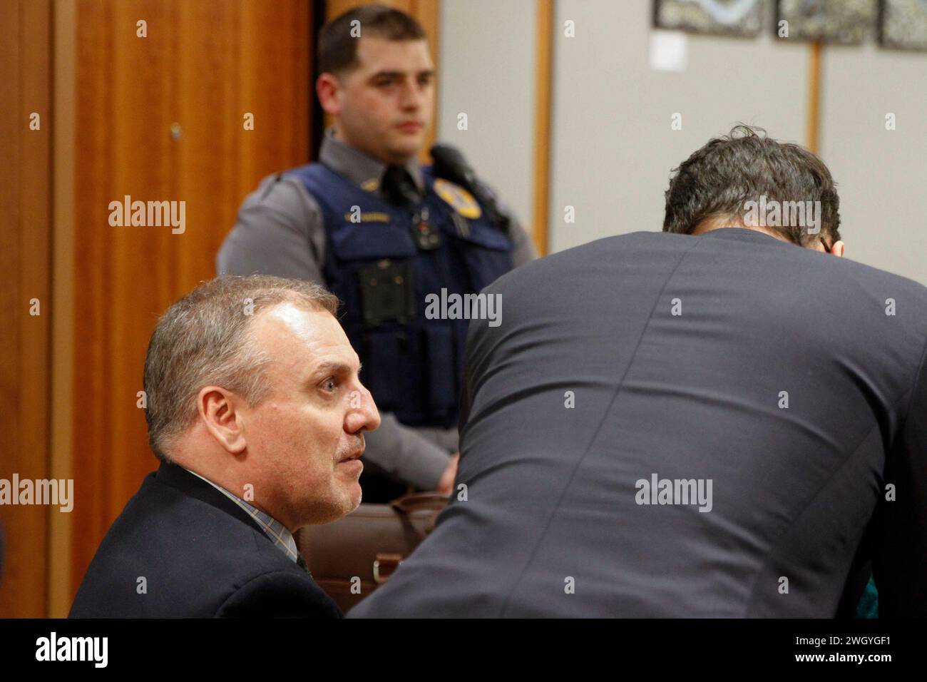 Brian Steven Smith confers with his attorneys during the opening day of ...