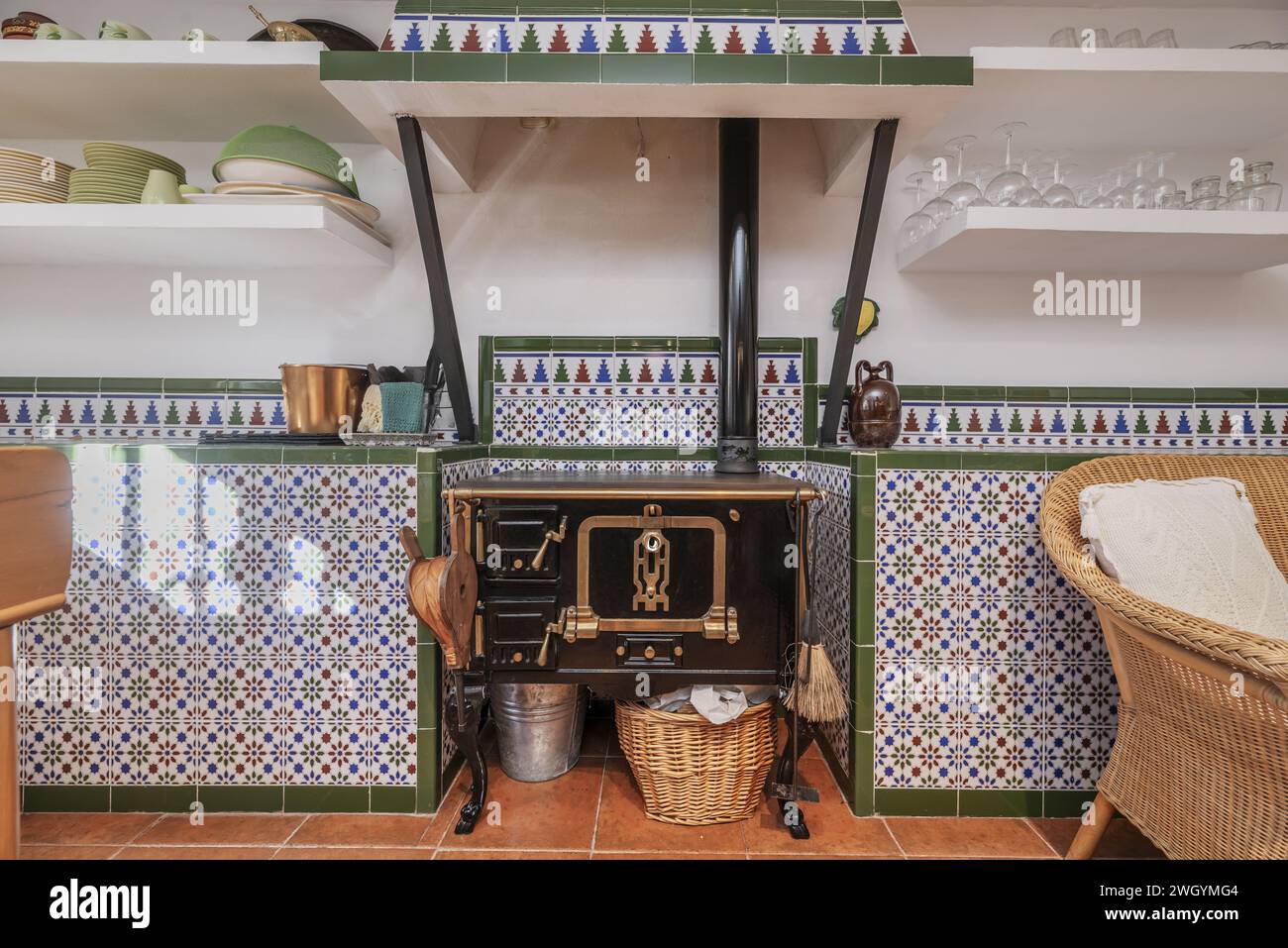 A metal cast iron kitchen in an Andalusian style wine cellar Stock ...