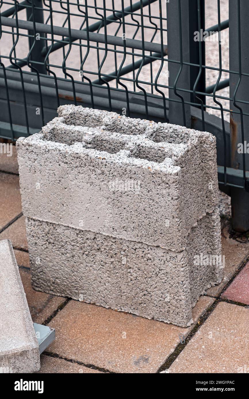 Concrete cinder block construction material outside on a street Stock ...